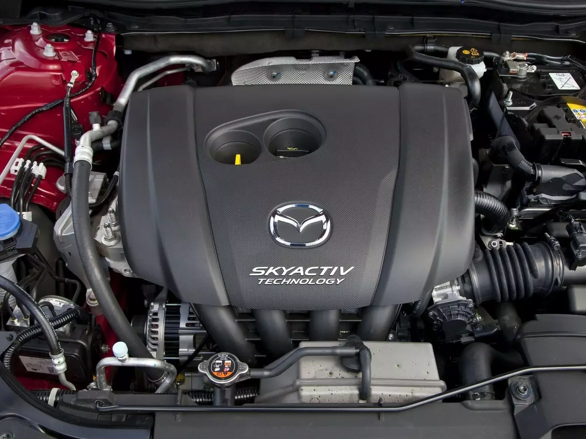 Mazda 3 bm: müsbət və eksiklikleri, mülkiyyət rəyləri 21865_12